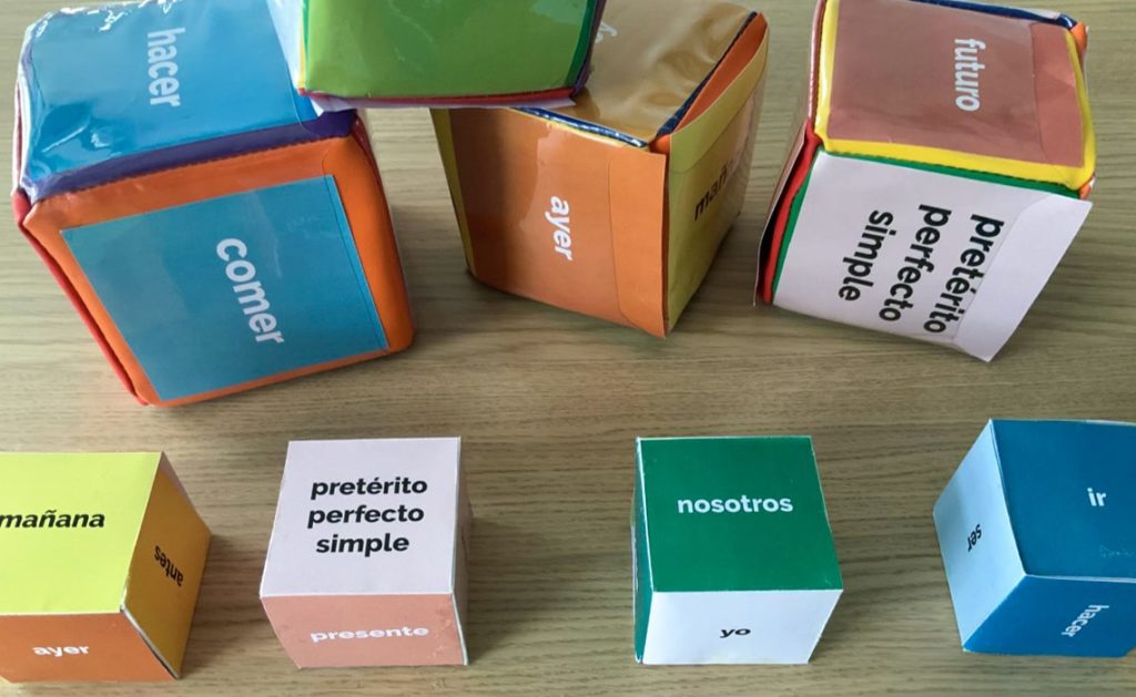 Descarga: El dado de los verbos - Hop'Toys